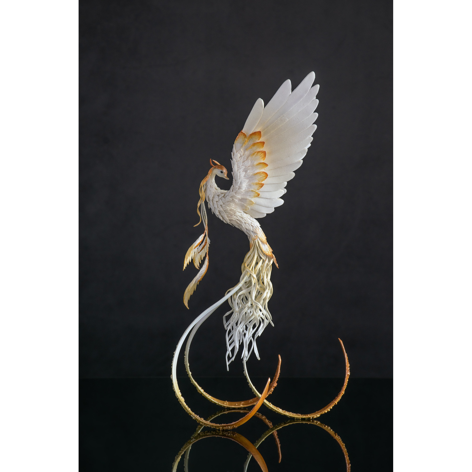Collectible Phoenix Statue bird made of air clay. White and gold bird
