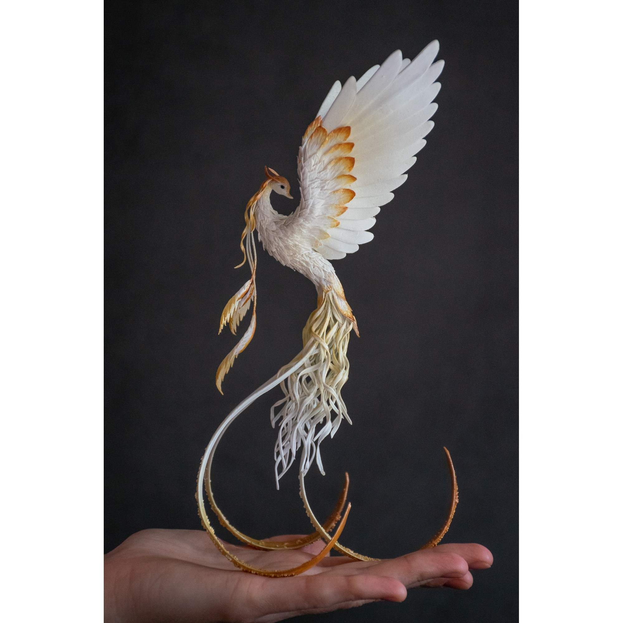 Collectible Phoenix Statue bird made of air clay. White and gold bird