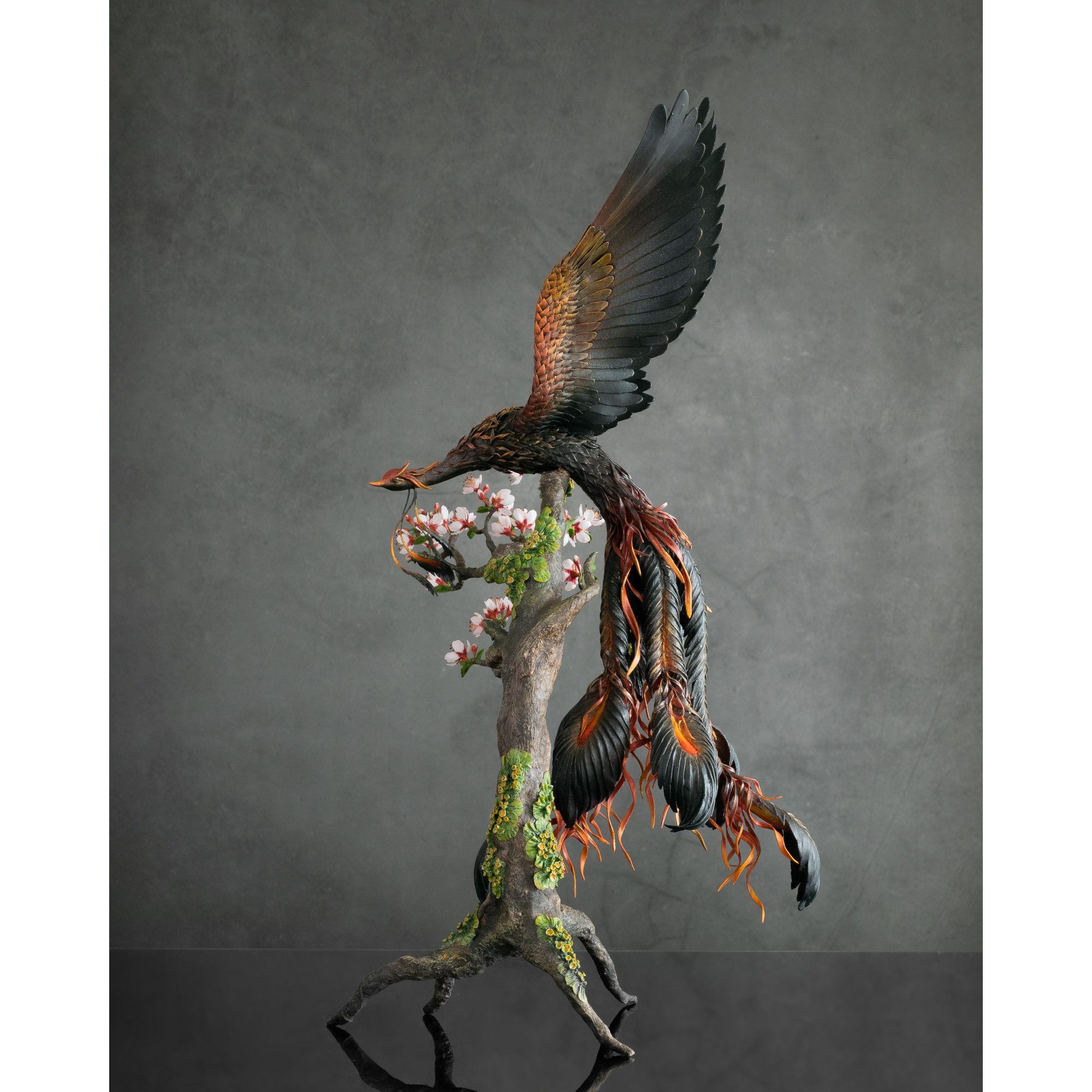 Collectible phoenix statue bird with sakura tree. Black fire bird