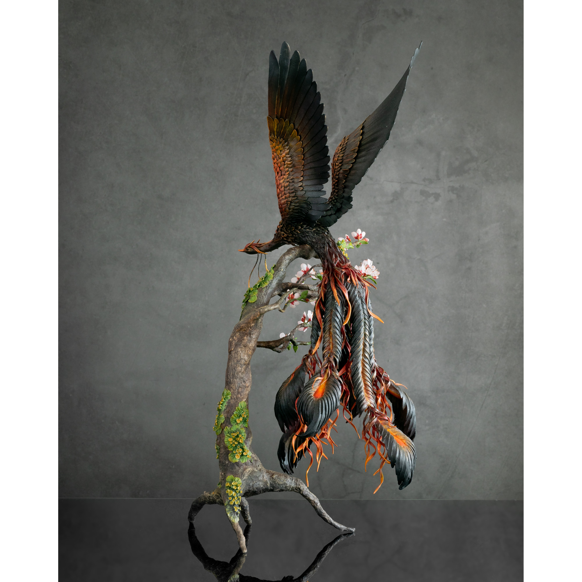 Collectible phoenix statue bird with sakura tree. Black fire bird
