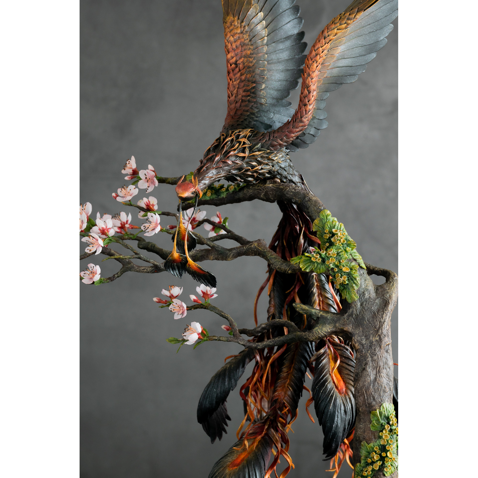Collectible phoenix statue bird with sakura tree. Black fire bird