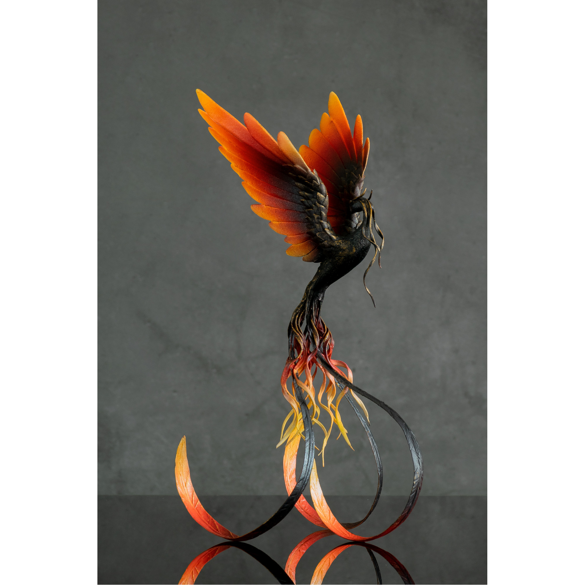 Handmade Phoenix statue bird. Dark fire bird