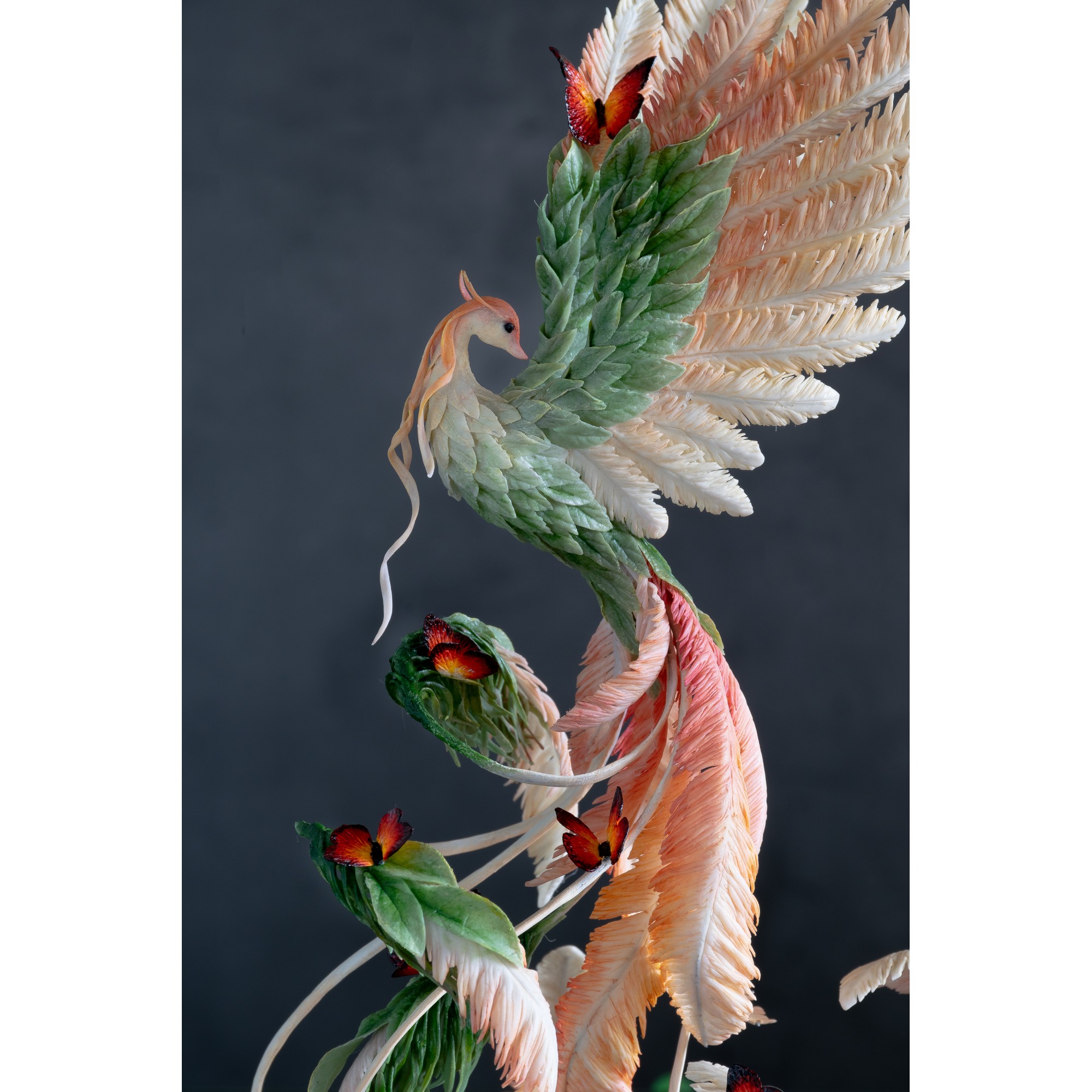 Collectible phoenix statue bird with fire butterfly . Fire bird